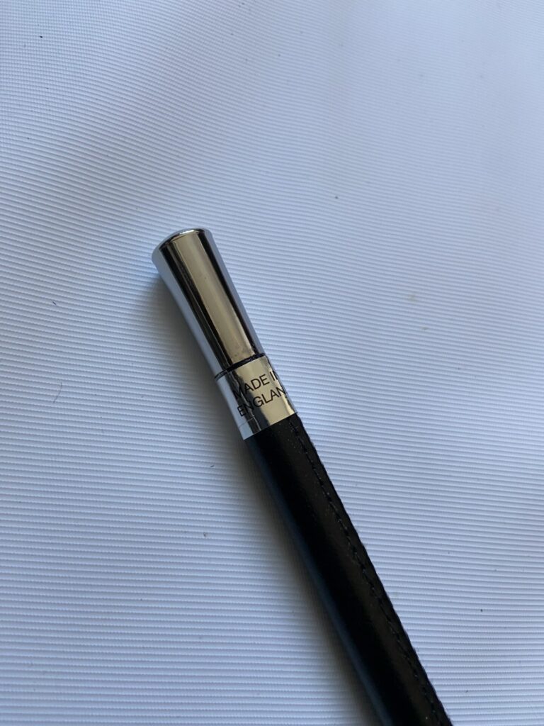 Leather covered cane with silver caps – Bondatrix